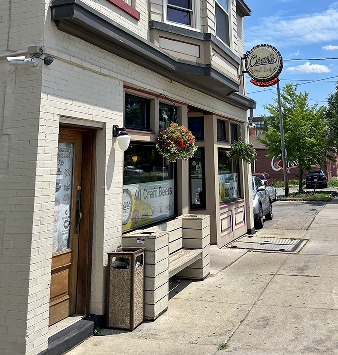 The welcoming storefront with hanging flower baskets says "come for the craft beer, stay for the burgers that will haunt your dreams."