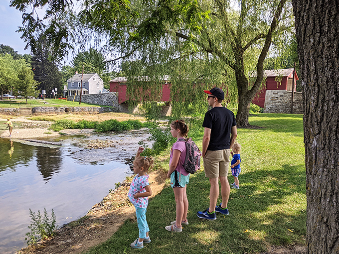 Families gather beside the bridge, creating memories that'll outlast any smartphone photo &ndash; though they'll take those too.