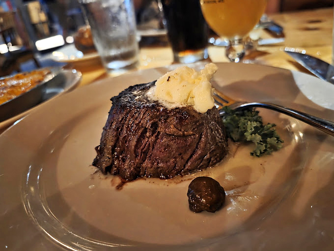A filet mignon so perfectly cooked it makes you wonder if the chef has some sort of bovine telepathy to achieve such transcendent tenderness.