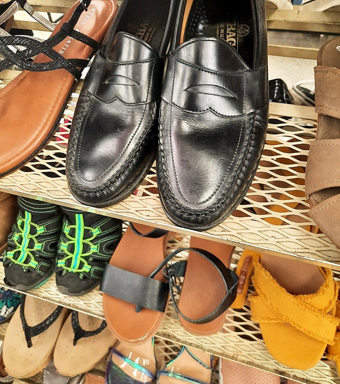 Leather loafers and summer sandals lined up like hopeful contestants in a beauty pageant, each waiting for their Cinderella moment.