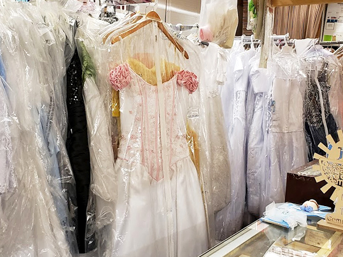 Wedding and formal wear hangs in pristine condition, proving something old can indeed be something new for your special occasion.