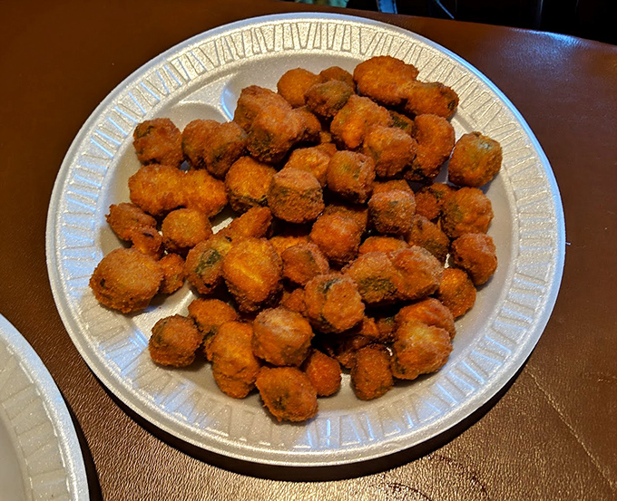 Fried okra: the South's vegetable contribution to the happiness index, transformed into golden nuggets of joy.
