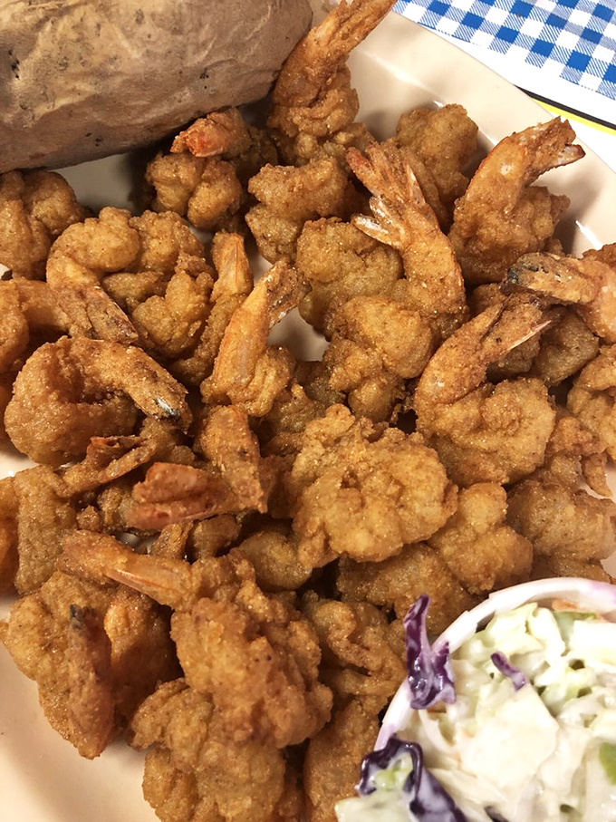 A mountain of golden fried shrimp that makes you wonder why you'd ever order just a half-portion of anything.