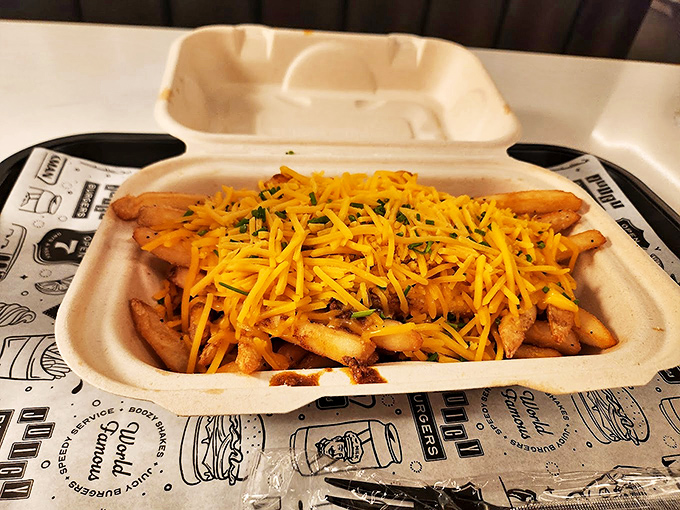 Cheese fries that don't mess around&mdash;crispy potatoes blanketed in melted cheddar that stretches with each bite like in those slow-motion food commercials.