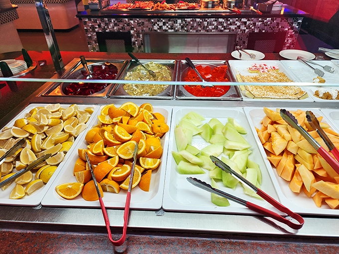 Fresh fruit that brings a bright, sweet counterpoint to your savory feast. Orange wedges standing at attention like citrus soldiers guarding your five-a-day.