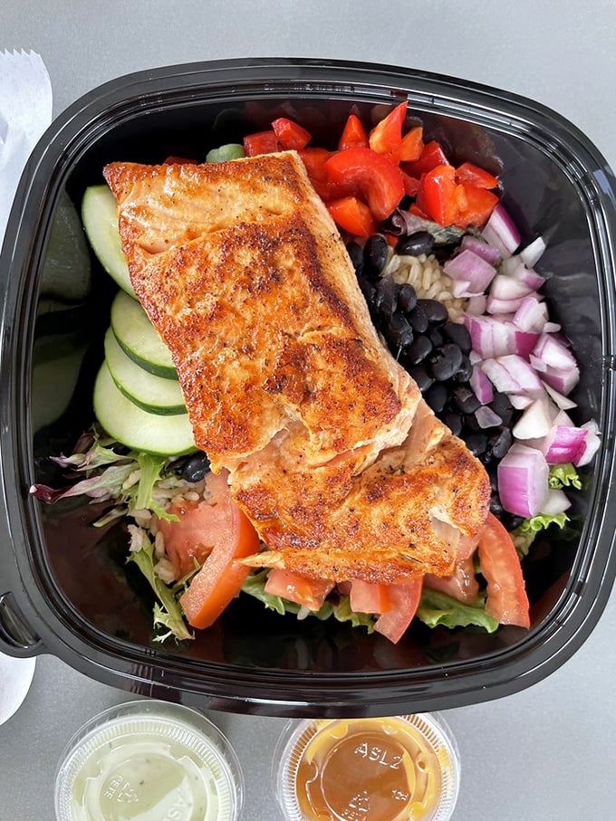 Proof that not everything delicious needs to be fried – this perfectly grilled salmon atop fresh veggies is Florida's lighter side showing off.