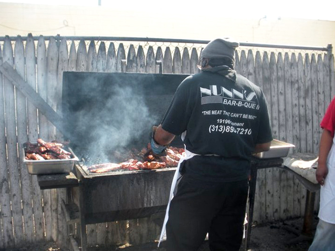 Where the magic happens&mdash;smoke billowing around meat on the grill, transforming ordinary cuts into extraordinary barbecue through time, patience, and skill.