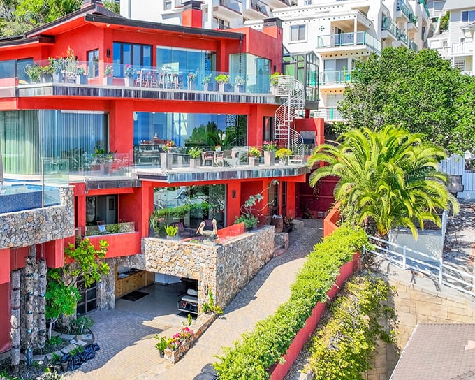 This striking red hillside villa proves that Catalina architecture isn't just about Mediterranean whites&mdash;it's about dramatic views and living on the edge, literally.