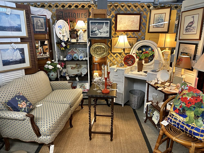 Lattice backdrops frame this sophisticated booth like a garden party for antiques. The neutral palette lets each treasure shine on its own merit.