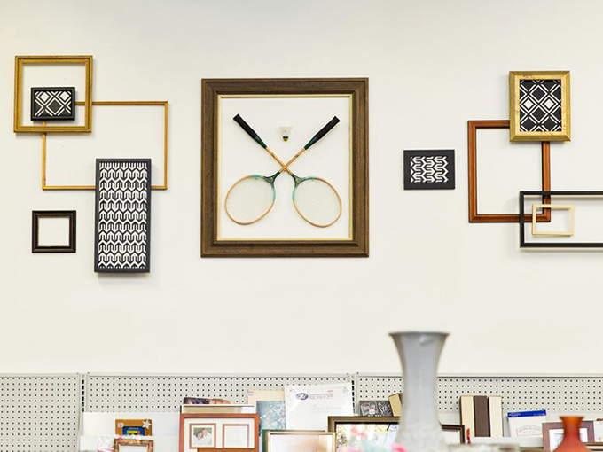 Wall art that tells stories of previous homes, now waiting for the perfect spot in yours. Tennis rackets never looked so decorative!