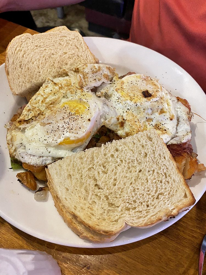 The "hot mess" lives up to its name in the best possible way. A beautiful chaos of breakfast favorites that somehow makes perfect sense with each bite.