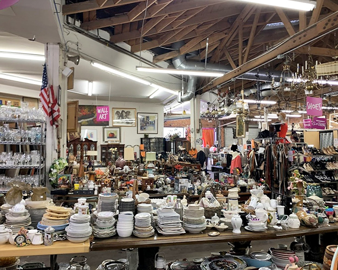 Organized chaos at its finest. The sheer abundance of dishware creates a treasure hunter's paradise where patience yields the perfect matching set.