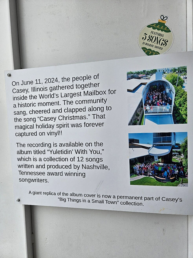 A plaque commemorates when Casey residents gathered inside to record "Casey Christmas," proving this mailbox delivers more than just letters&mdash;it creates community memories. 
