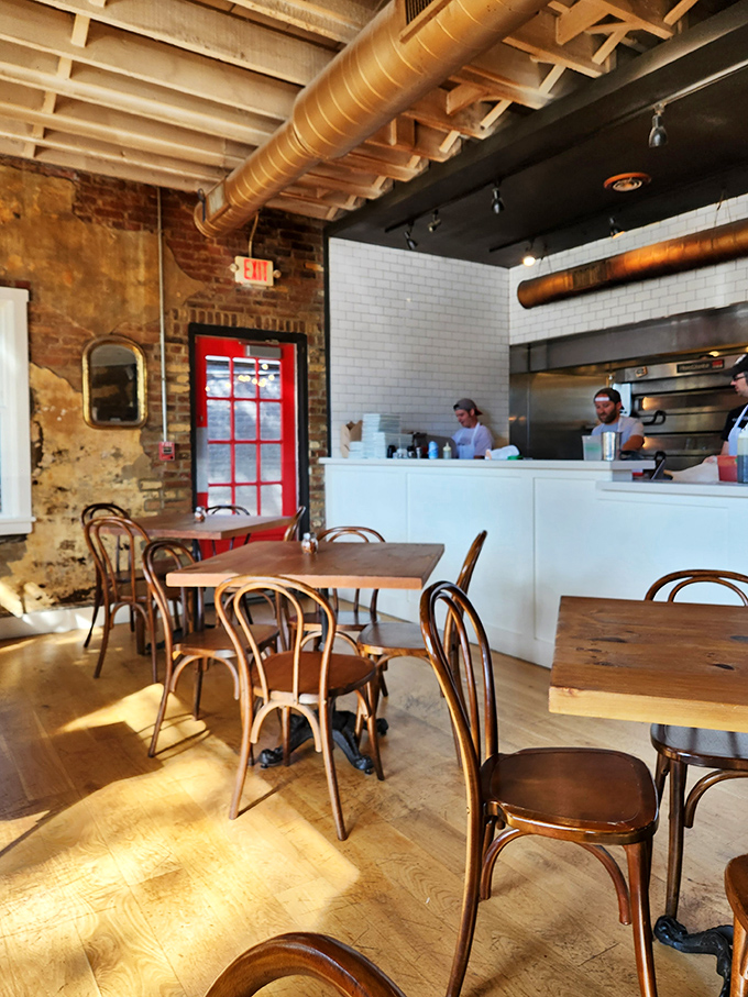 The open kitchen isn't just functional&mdash;it's dinner theater where dough-tossing becomes performance art and anticipation becomes an appetizer.