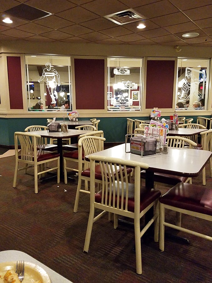 The dining area's thoughtful design creates intimate spaces within the larger restaurant. Those dividers aren't just decor&mdash;they're conversation incubators.