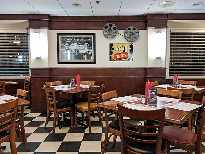 The dining area feels like the set of "Happy Days" but with better food. Those movie reels on the wall aren't just decoration&mdash;they're foreshadowing the feature presentation on your plate.