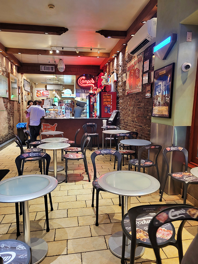 The lunch rush at Campo's&mdash;where the neon signs glow, the grill sizzles, and hungry patrons patiently wait for their turn at Philadelphia sandwich nirvana.