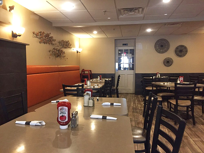 Warm wood tones and comfortable seating create that "everybody knows your name" vibe, minus the bar tab from Cheers.