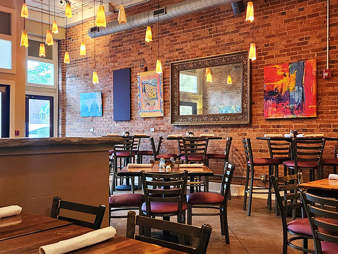 Exposed brick walls and pendant lighting create an atmosphere that says, "Stay awhile, the calories don't count if you're having fun."