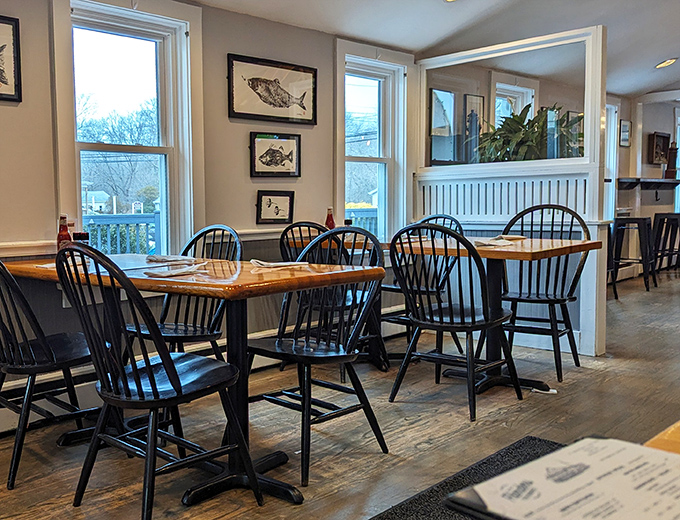 Classic New England dining room charm meets modern comfort in this light-filled space that welcomes everyone.