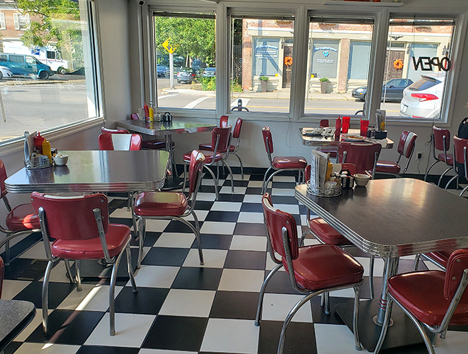 Morning light streams through windows, illuminating empty tables that won't stay that way once the breakfast crowd arrives.