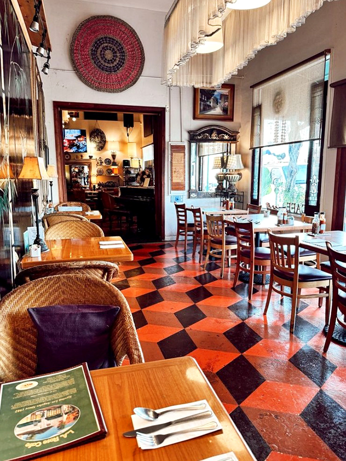 The checkered floor and woven chairs aren't just decor&mdash;they're storytellers. Each corner of this dining room has probably witnessed countless "mmms" and "oh my gods."