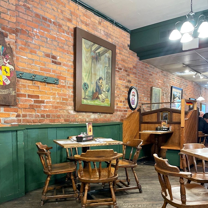 The dining room feels like someone's lovingly preserved family home, where exposed brick meets wooden chairs that have supported generations of satisfied diners. 