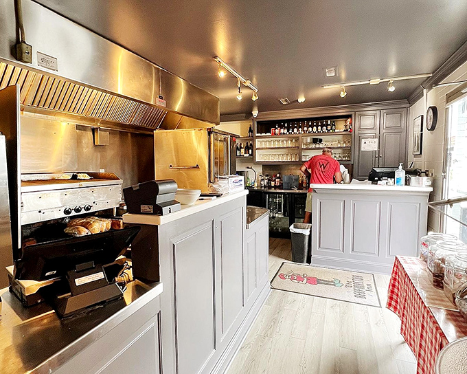 The kitchen gleams with the quiet confidence of a place that knows exactly what it's doing. No fancy gadgets needed when you've mastered the fundamentals.