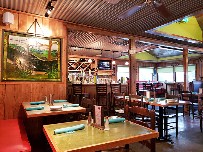 The stained glass, wooden accents, and warm lighting create an atmosphere that says "stay awhile" without having to say a word.