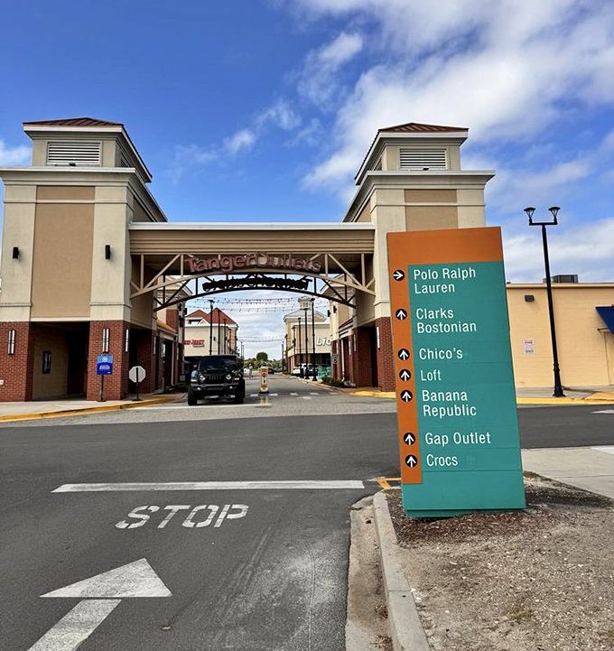 The entrance sign that promises brand names without the brand-name prices&mdash;like a roadmap to retail nirvana.