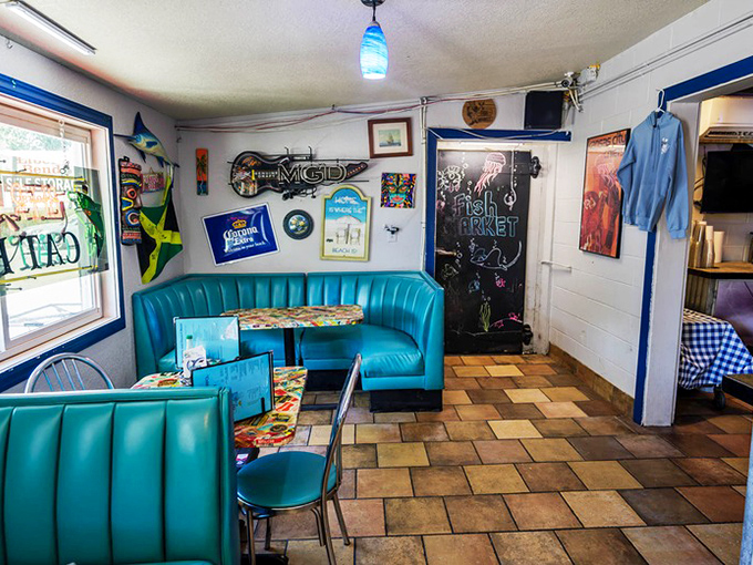 Another angle reveals the diner's playful personality &ndash; beer signs, fishing d&eacute;cor, and that unmistakable "you're among friends" vibe that makes regulars out of first-timers.