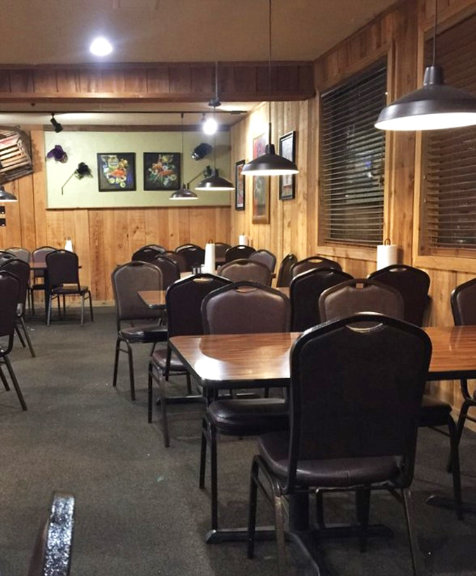Wooden paneling and pendant lights create the perfect backdrop for post-show dinner conversations.
