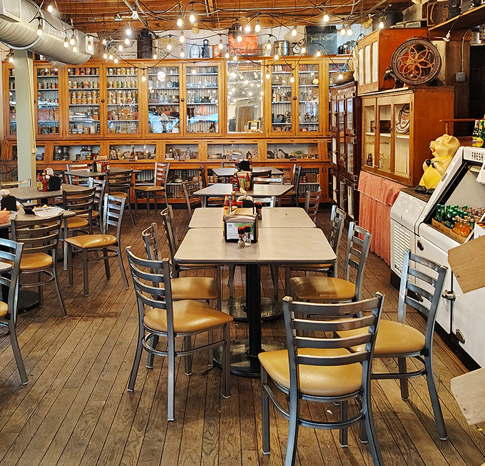 Wooden floors, vintage cabinets, and simple tables create an atmosphere where time slows down and conversations flow as freely as the sweet tea.