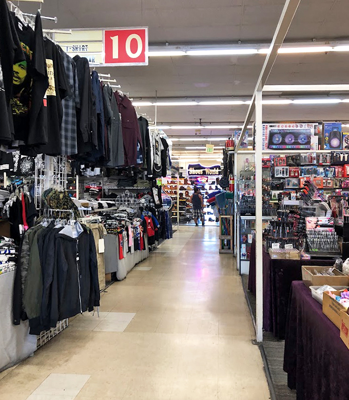 Aisle 10: where retail therapy meets organization. The numbered signs help shoppers navigate this labyrinth of bargains without breadcrumbs.