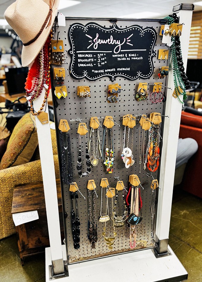 Treasure island in miniature! This jewelry display transforms costume pieces into conversation starters. One person's discarded necklace becomes another's signature piece.