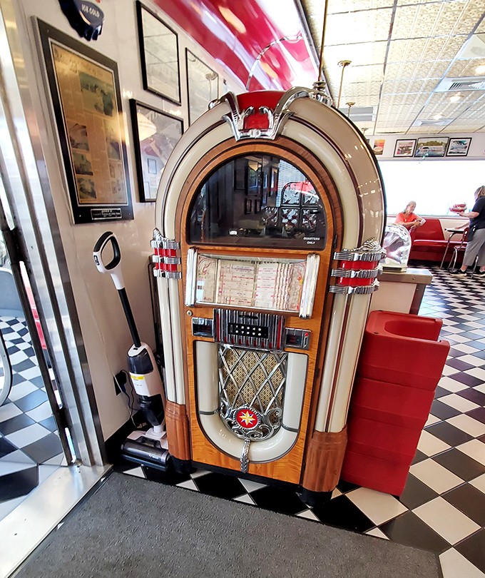 The vintage jukebox doesn't just play songs; it's a time machine that transports you back to when Elvis was king.