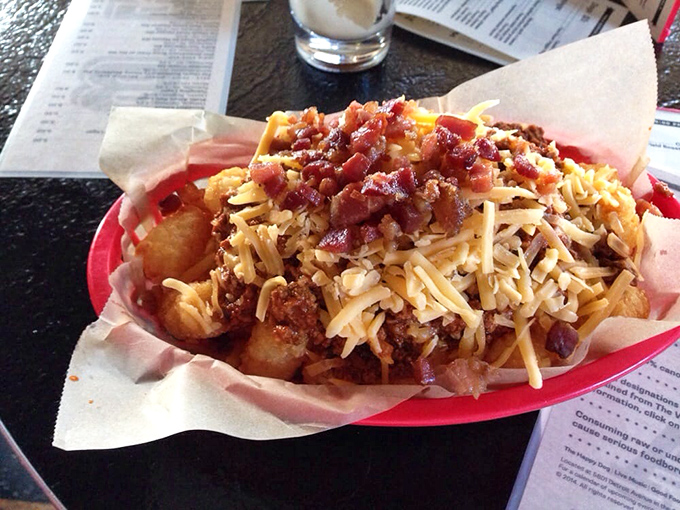 Loaded tots: where potato meets party. These crispy little spud bombs are what would happen if potatoes went to Mardi Gras.