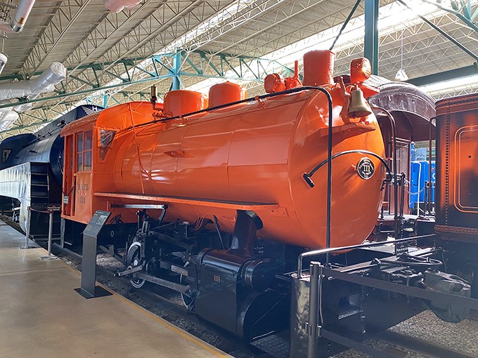Locomotive No. 111 sports a vibrant orange coat that would make even the most jaded commuter smile with delight.