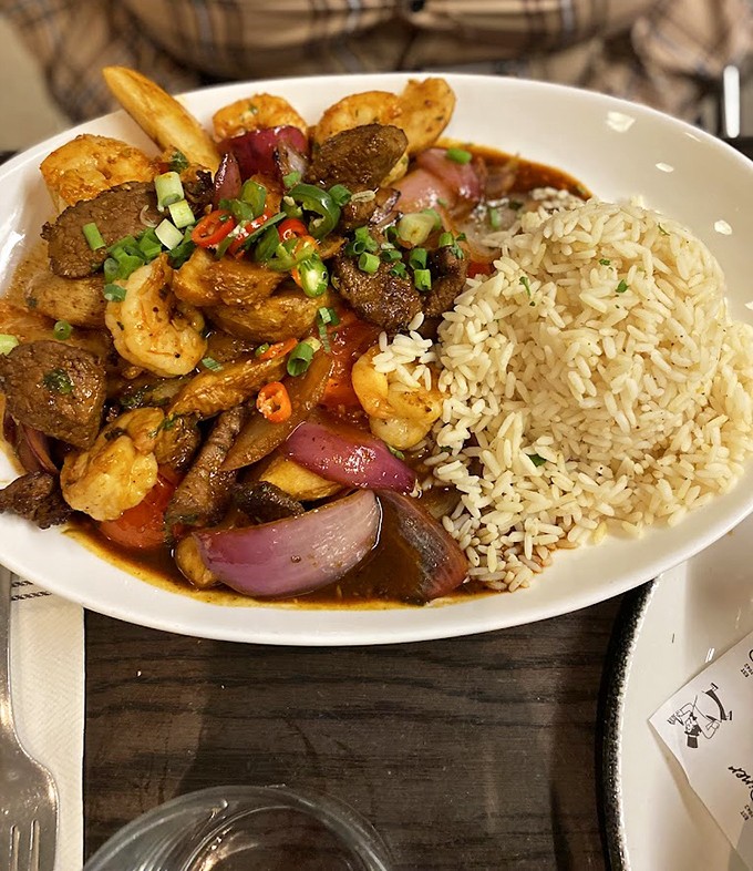 A colorful fiesta of beef, shrimp, and vegetables doing the tango with perfectly cooked rice&mdash;proof that Tops' culinary passport has stamps from around the world.
