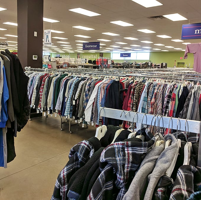 Men's shirts lined up like soldiers ready for a second tour of duty. The plaid selection alone could outfit a lumberjack convention.