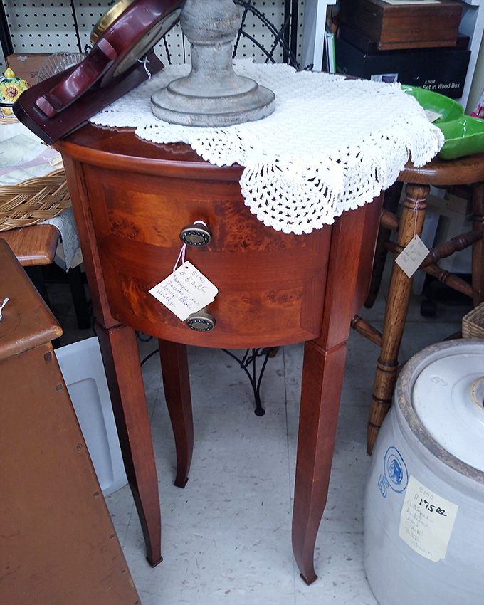 Elegant craftsmanship meets grandmother's doily in this mahogany side table. Furniture that remembers when phone calls were events, not interruptions.