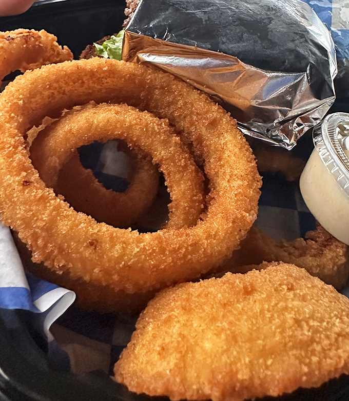 Onion rings with that perfect crunch. The sound these make when you bite into them should be classified as ASMR for food lovers.