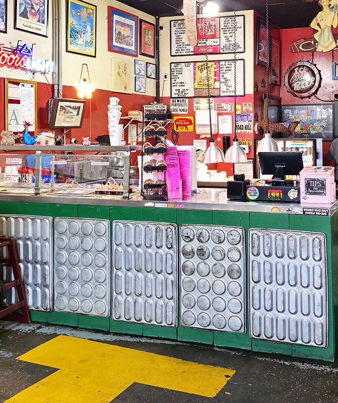 Behind this counter, barbecue magic happens daily. No wizards, just pitmasters who understand the sacred relationship between meat, smoke, and time.