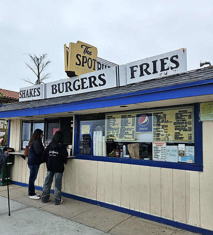 Classic burger stand architecture that says "we're too busy making great food to worry about Instagram aesthetics."