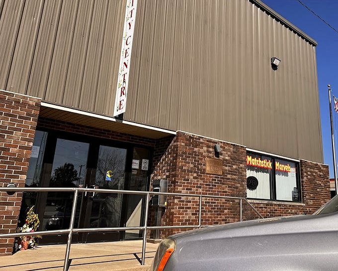 The modest brick-and-metal exterior of Matchstick Marvels offers no hint of the wooden wonders waiting inside this Gladbrook gem.