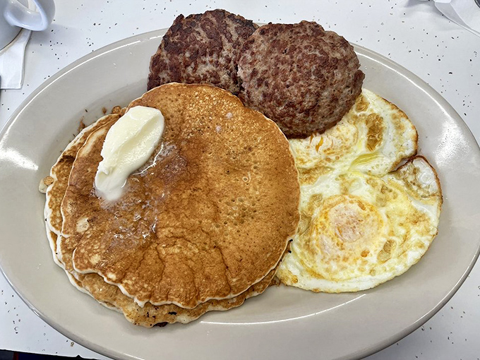 A pancake, eggs, and sausage patty&mdash;the breakfast equivalent of a greatest hits album where every track deserves to be there.