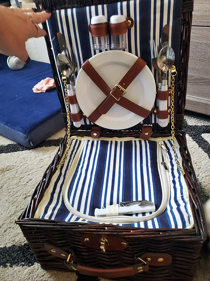 Not just a picnic basket, but a portable party waiting to happen, complete with nautical stripes that practically smell of ocean breezes.
