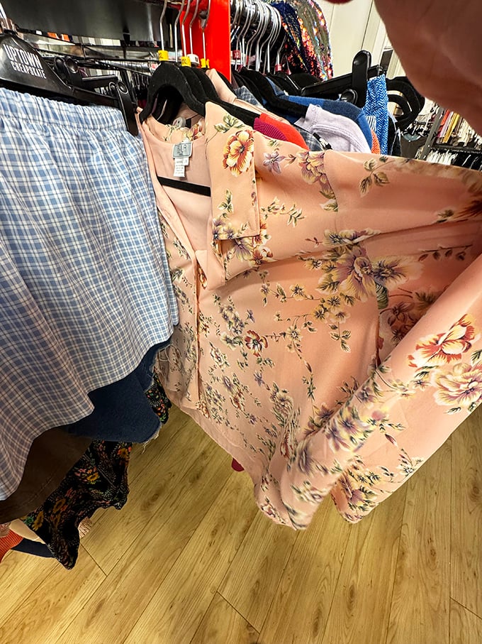 Floral fantasies bloom on this peachy blouse. Spring arrives whenever you decide to wear this garden-inspired piece.