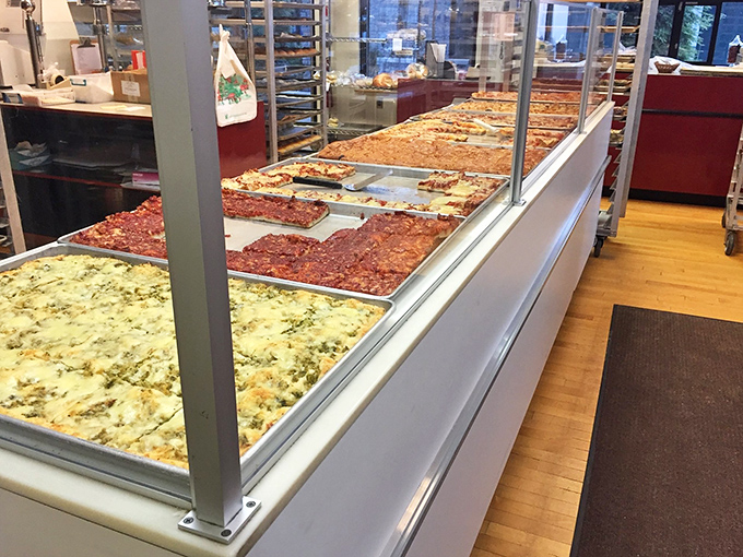 The savory side of paradise &ndash; sheet pans of pizza that prove Bakery Delite understands all dimensions of dough.
