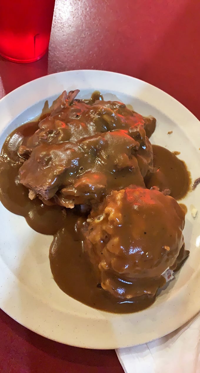 Pot roast that looks like it's been simmering since the Carter administration, in the best possible way.